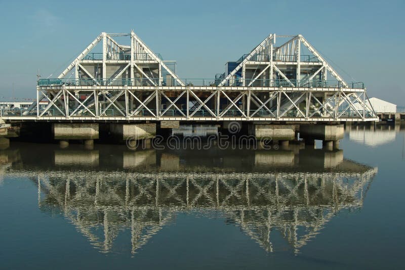 Metallic Building on the Water Stock Image - Image of urban, technology ...
