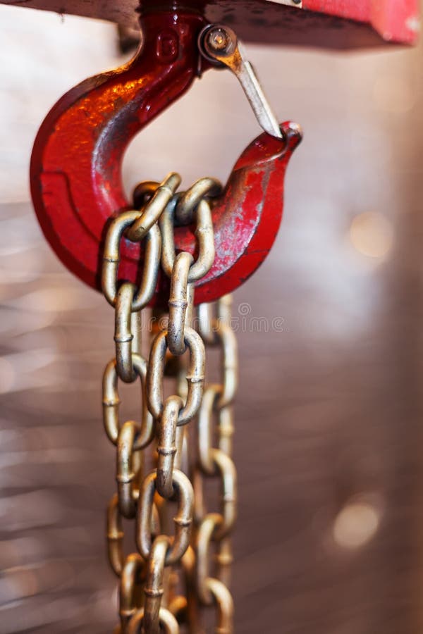 Metallic Chain Handle with Red Hook in Technical Room. Crane Cargo Hook ...