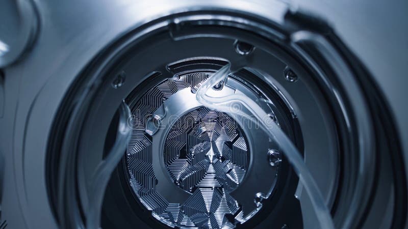 Metallic Circular Device with Intricate Patterns and Transparent Tubes ...