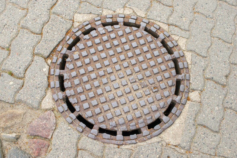 Metallic city hatch stock image. Image of drain, pavement - 129377793