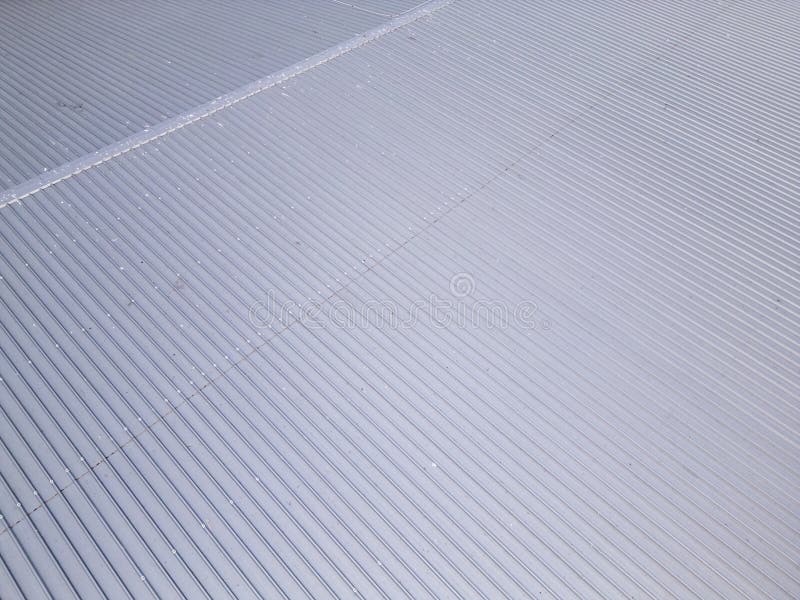 Metallic Corrugated Sheet Roof with Linear Patterns. Industrial and ...