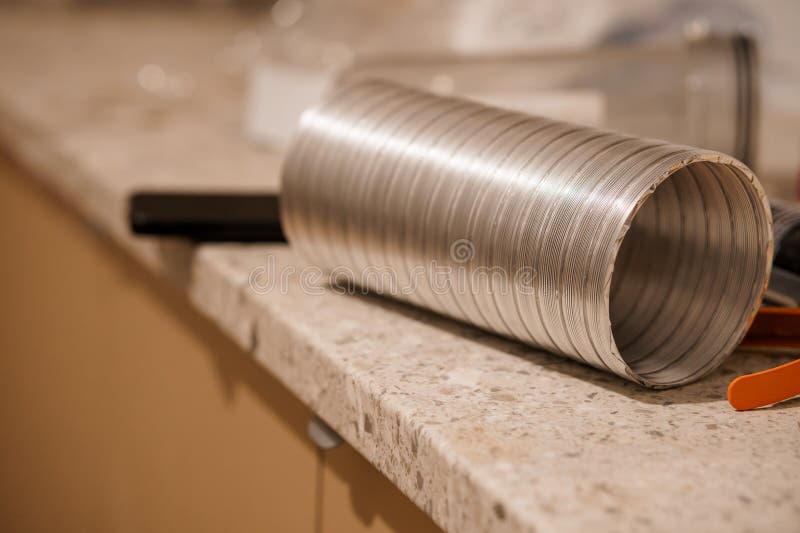 Metallic Cylinder on a Kitchen Countertop Stock Photo - Image of ...