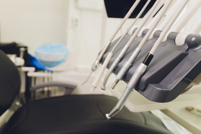 Metallic Dentist Tools Close Up on a Dentist Chair in Dentist Clinic ...