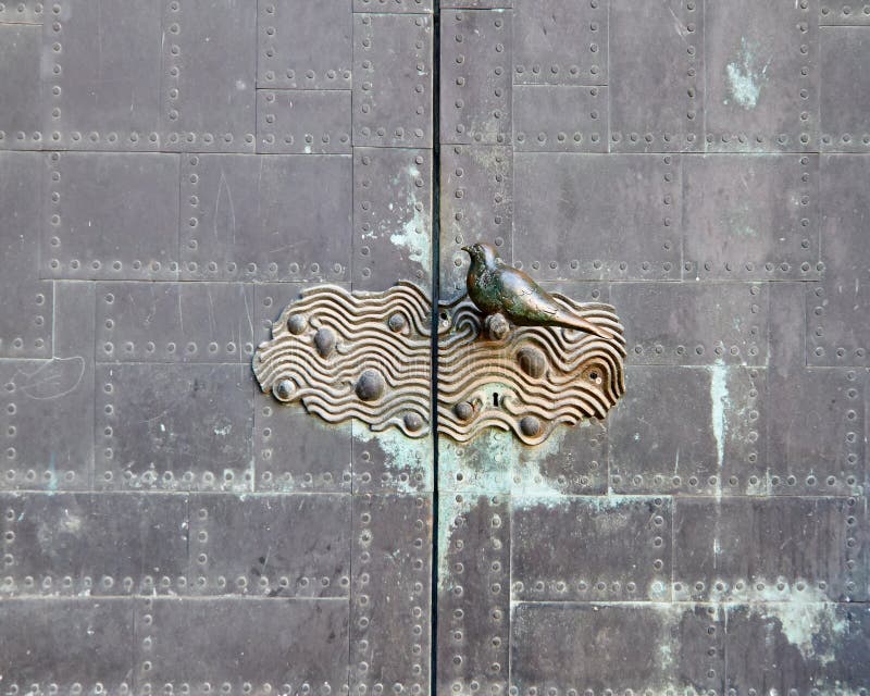Metallic Door Detail and Bird Shaped Handle Stock Image - Image of ...