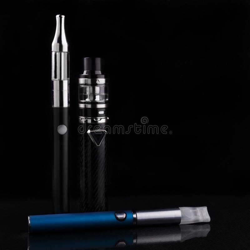 Electronic Cigarettes or Vaping Devices on Black Background Stock Image ...