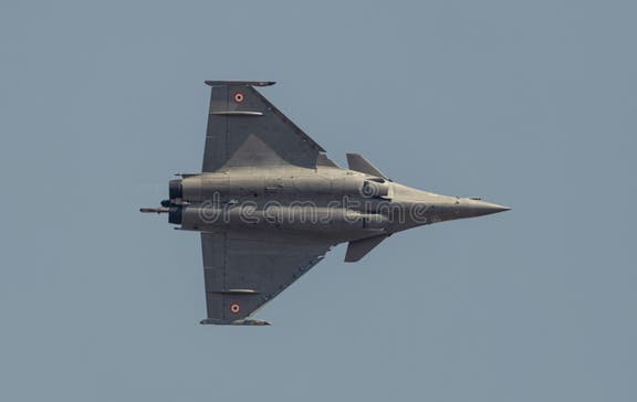 Metallic Fighter Jet Flying in the Blue Sky Editorial Photography ...