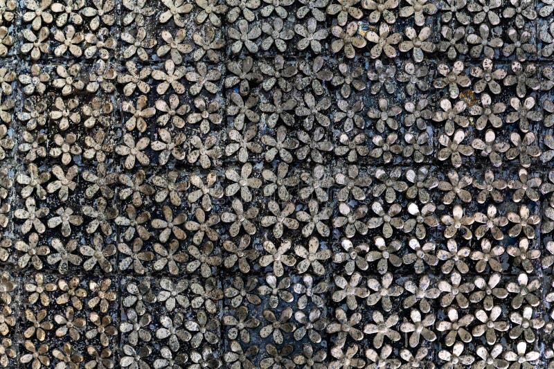 Metallic Flower Shaped Tiles Creating a Beautiful Textured Background ...