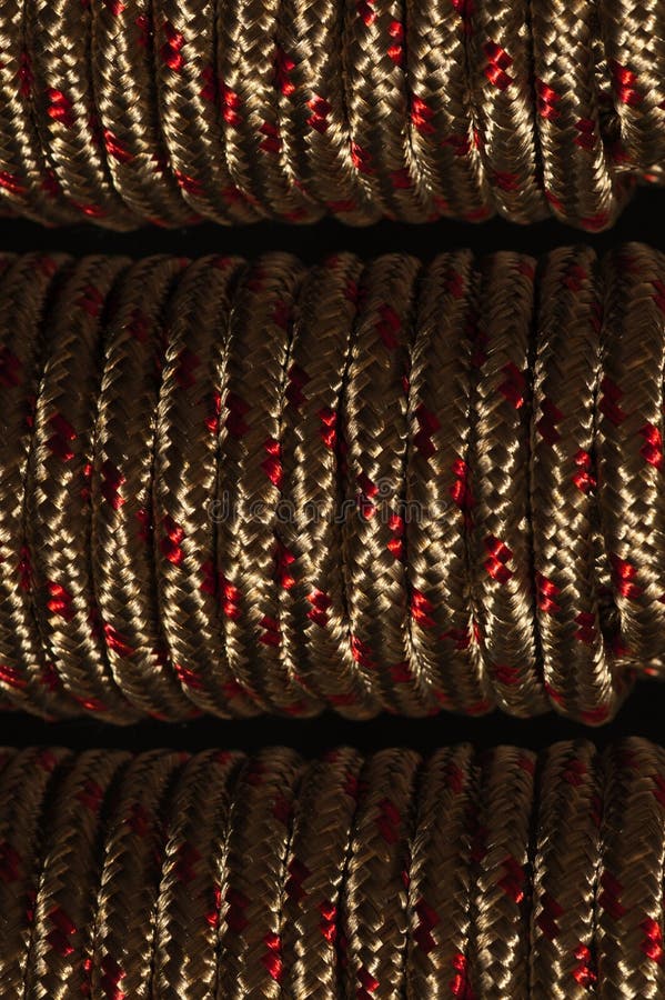 Metallic gold and red rope stock photo. Image of string - 189231084