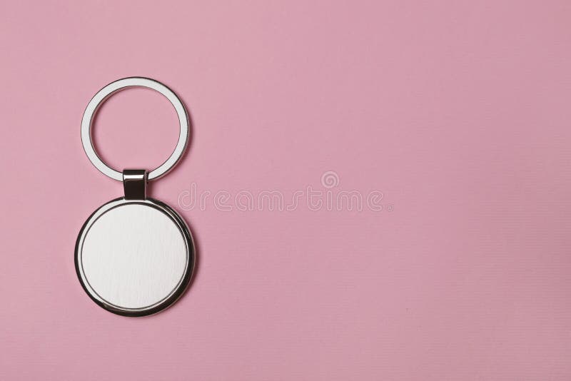 Metallic Keychain with Silver Key Ring on Pale Pink Background, Top ...