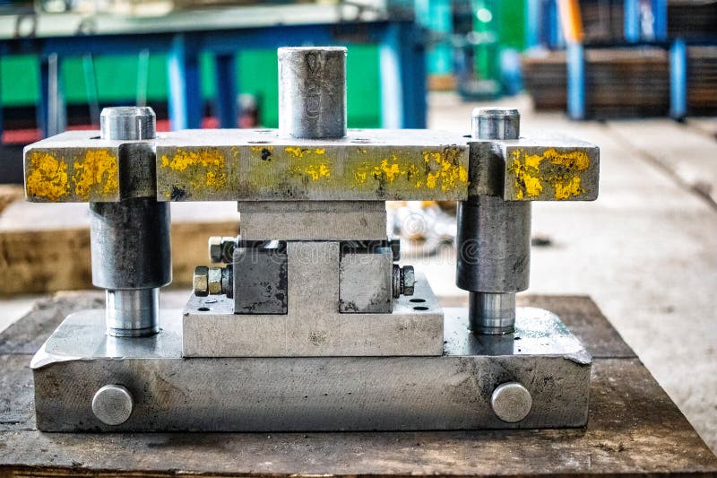 A Metallic Machine Component on a Workstation in an Industrial Facility ...