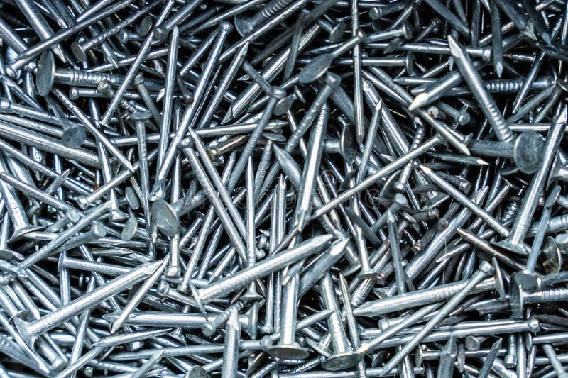 Metallic Nails Scattered in a Dense Pile, Construction Supplies Concept ...