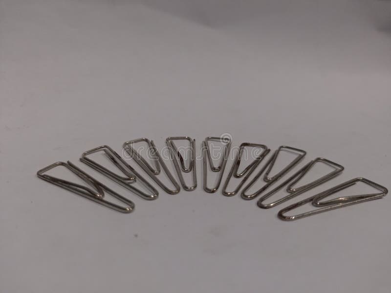 Metallic Paper Clip, Isolated on White Stock Photo - Image of ...