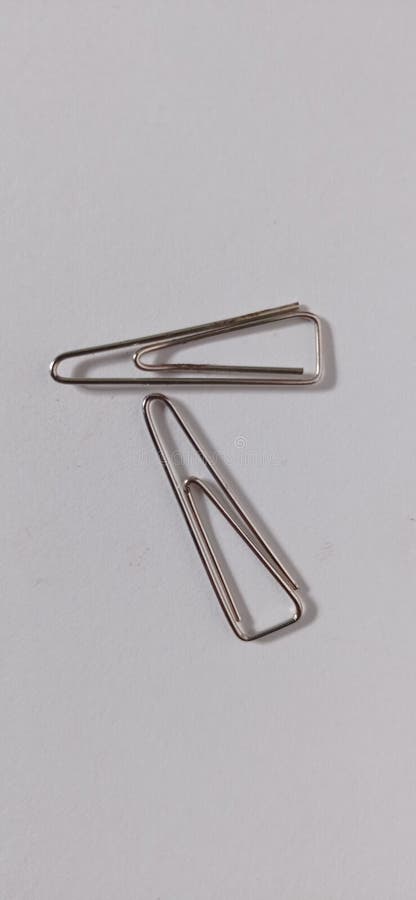 Metallic Paper Clip, Isolated on White Stock Photo - Image of metallic ...