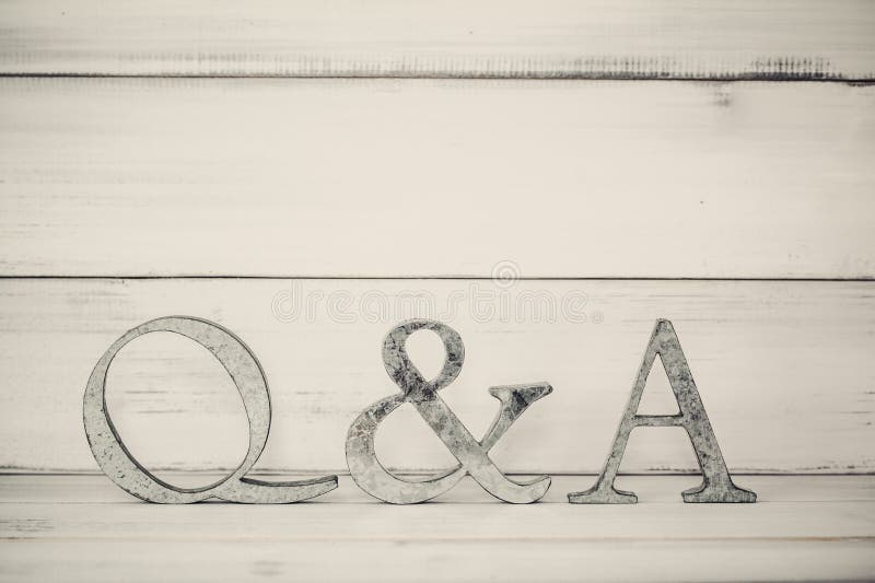 Metallic Q&a Letters on White Wooden Background Representing Question ...