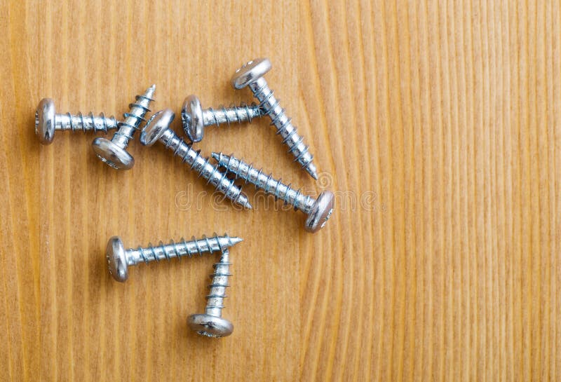 Screws on the floor stock image. Image of floor, instance - 34656255