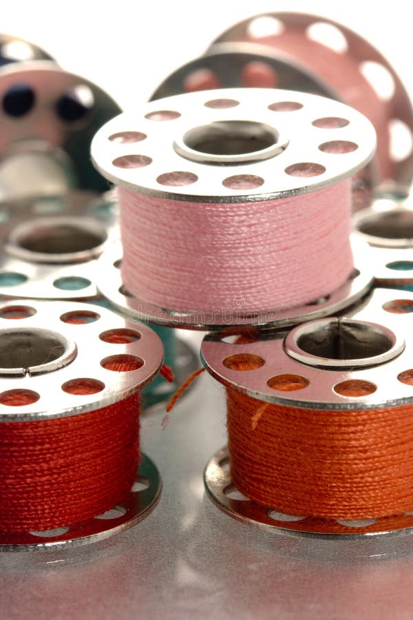 Metallic spools of thread stock photo. Image of macro - 7742752