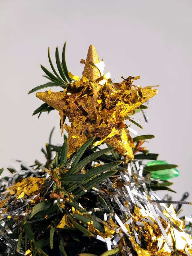 Metallic Star Christmas Tree Topper Stock Photo - Image of shaped ...