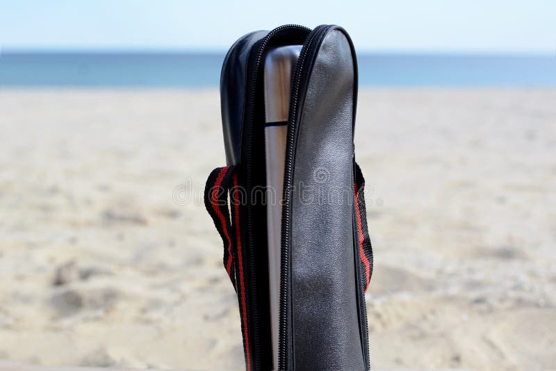 Metallic Thermos in Black Stylish Case on Sandy Beach Stock Image ...