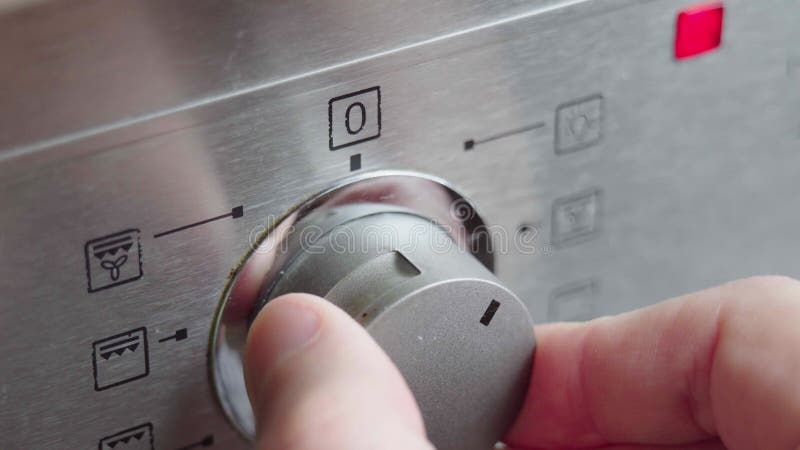 Metallic Toggle Switch of the Cooker Oven Close-up. Front Panel of ...