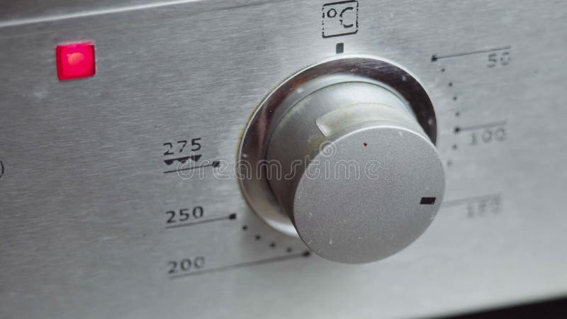 Metallic Toggle Switch of the Cooker Oven Close-up. Front Panel of ...
