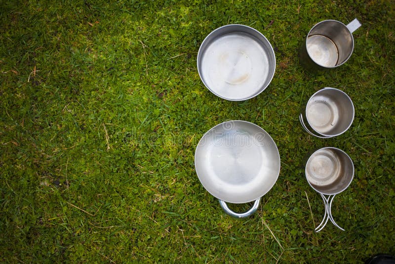 Metallic Utensils Standing on the Grass. Stock Image - Image of natural ...