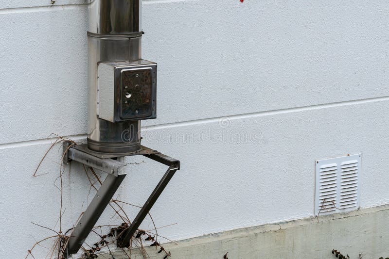 Vent Pipe Installation on a Building with Creeping Vines Stock Image ...