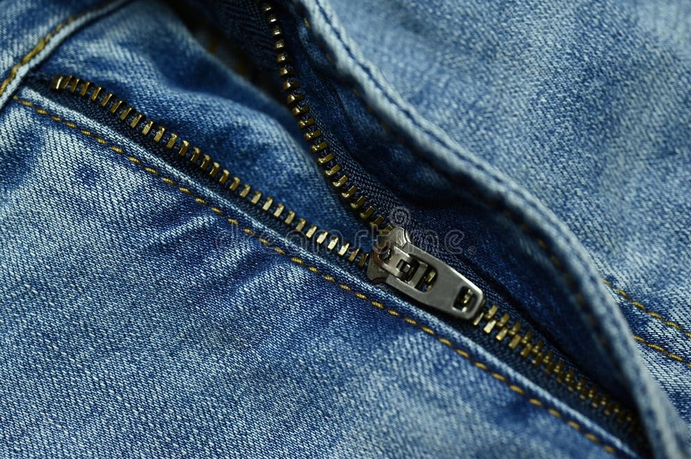 Metallic zip on blue jeans stock photo. Image of close - 280560392