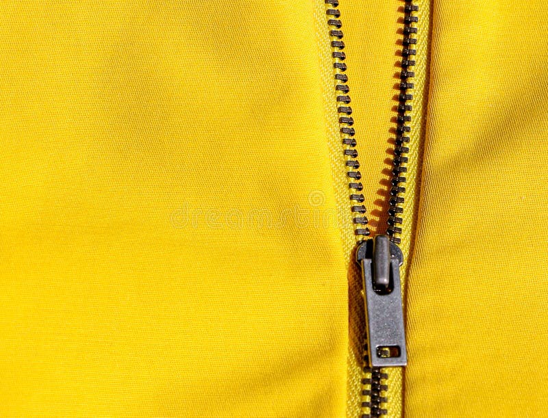 Metallic Zipper on the Yellow Skirt Stock Photo - Image of lock, thread ...