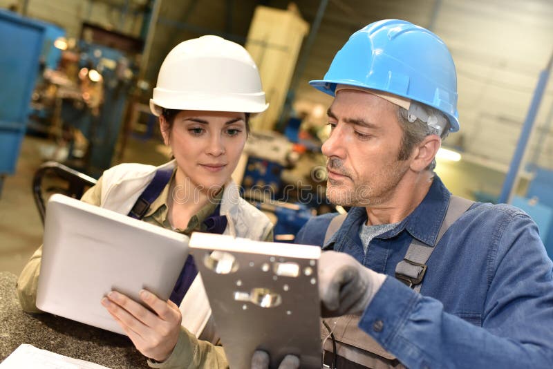 Manufacture Workers Setting Up Machinery Stock Image - Image of ...