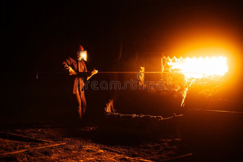 Metallurgists Taking Samples of Liquid Molten Metal Stock Photo - Image ...