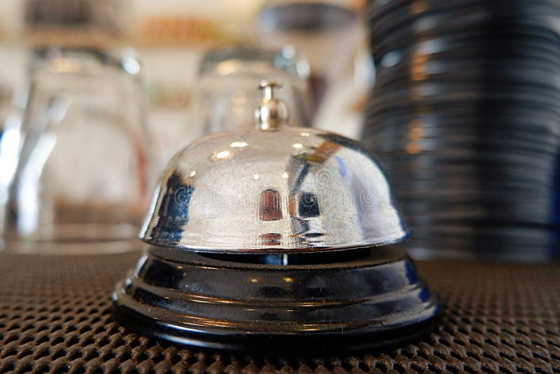 Metals bell at the cafe stock image. Image of golden - 262153761