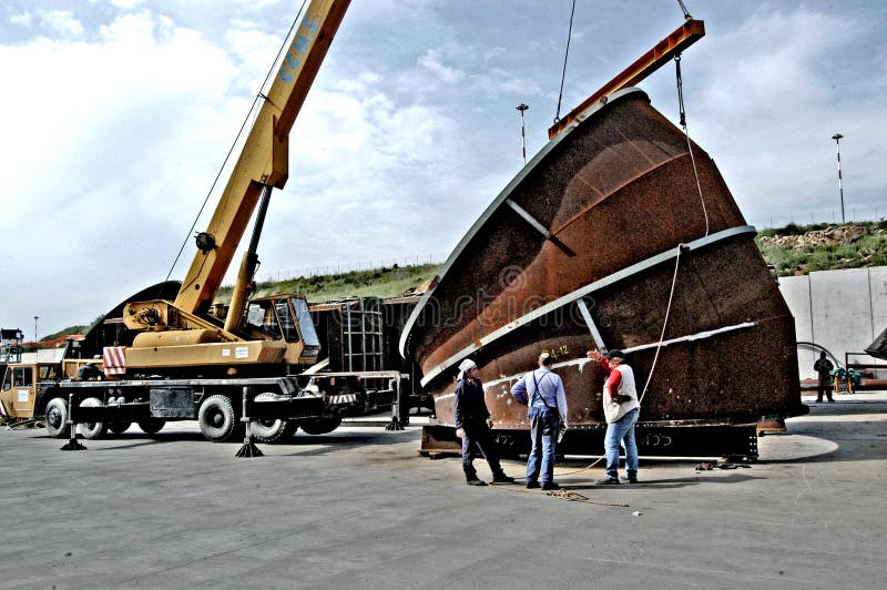Metalwork Construction of Large Tubes with Workers Working Welding ...