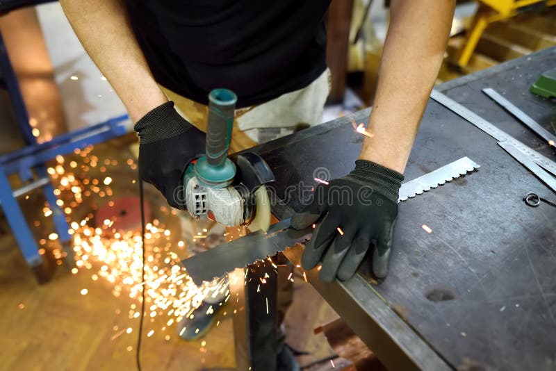 Metalwork Craftsman Cutting Metal with Grinder Tools. Worker Man in ...