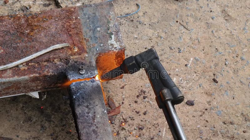 A Metalworker Demonstrates Welding and Cutting Showcasing Skills Stock ...