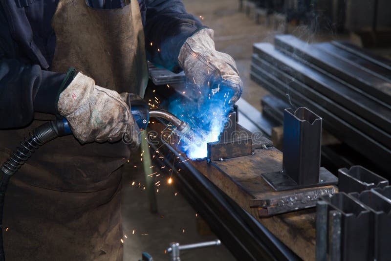 Metalworker in a workshop stock image. Image of metalwork - 75190077