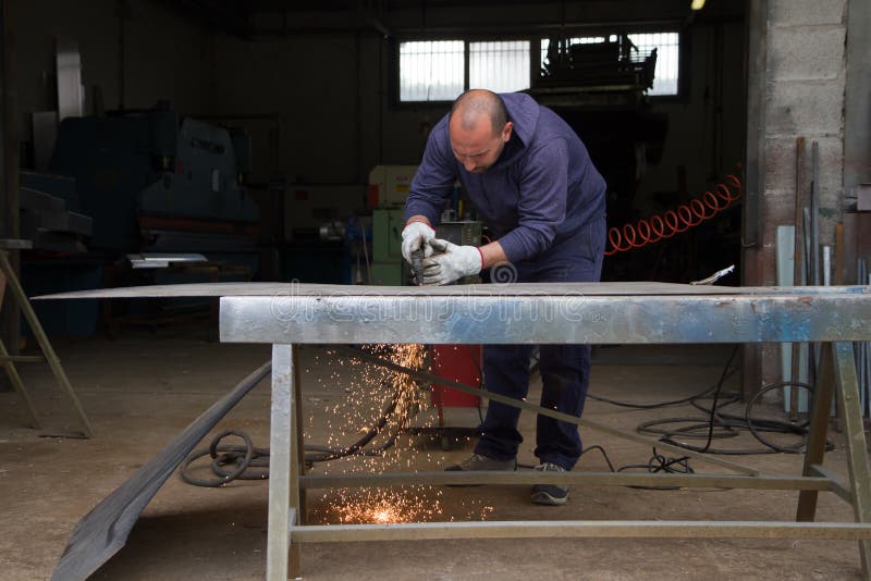 Metalworkers stock photo. Image of factory, construction - 15382384