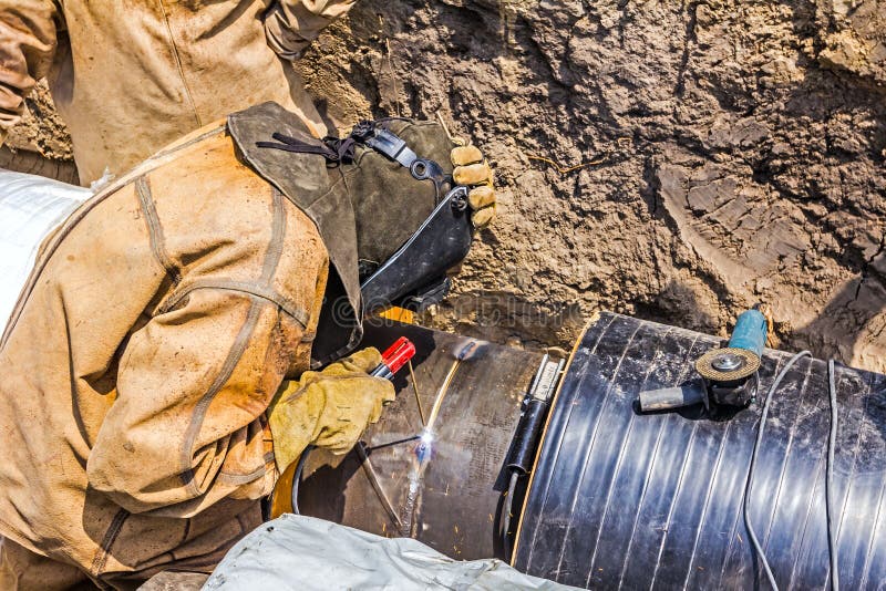 Metalworker Working on a Pipeline Stock Image - Image of metalworker ...