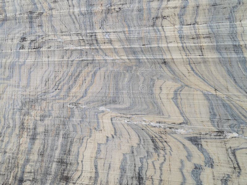 A Metamorphic Rock Called Gneiss Creates Pleasant Patterns Along Its ...
