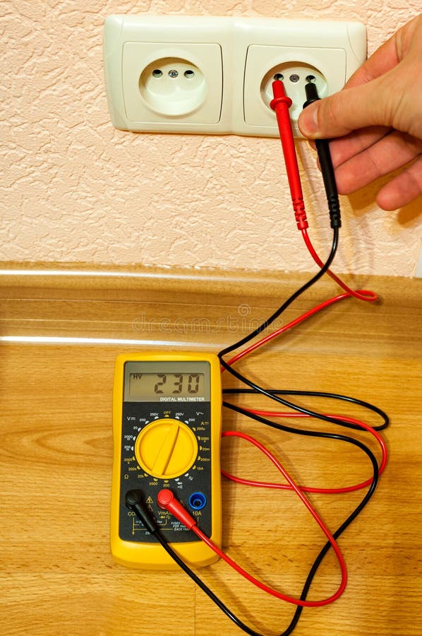 Metering Socket Voltage with Modern Digital Multimeter Stock Image ...