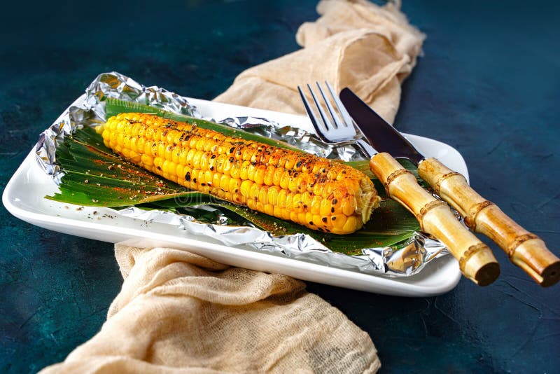 Cooked Corn Cobs on an Open Fire, Roasted Sweet Corn with Spices Flat ...