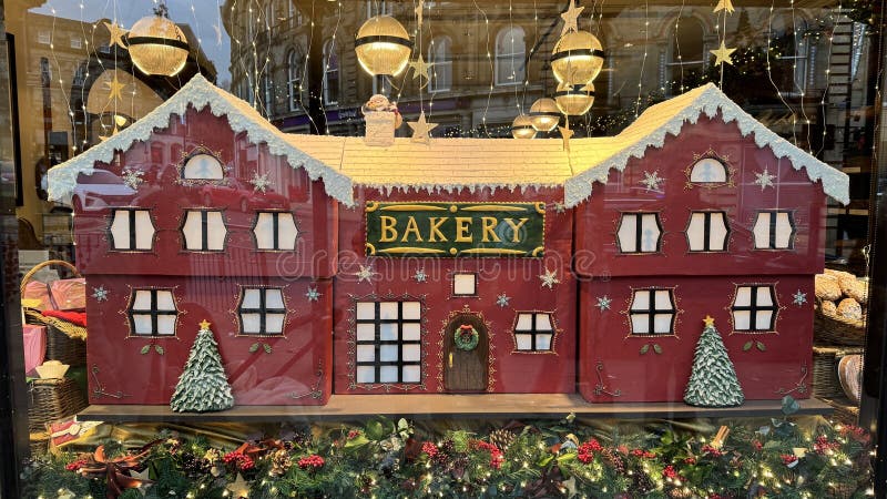 Christmas Bakery Display with Three Interconnected Buildings Stock ...