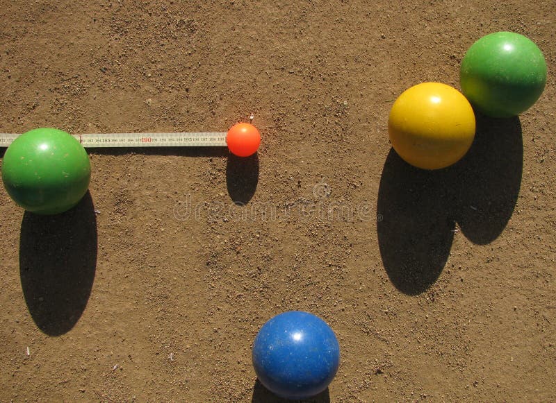A Metric Folding Ruler Will Determine the Winner of a Bocce Game. Stock ...