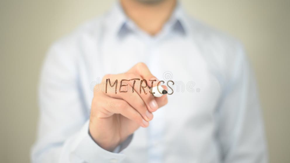 Metrics , Man Writing on Transparent Screen Stock Photo - Image of ...