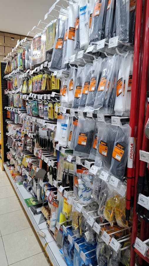 Metro, 15 Februari 2025 - Hardware Store Aisle with Various DIY Tools ...
