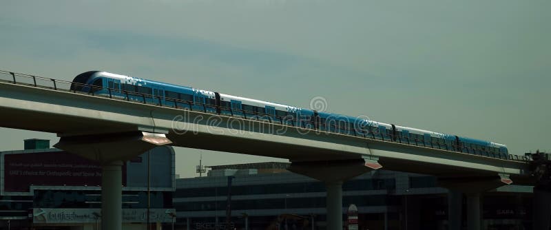Metro ride in Dubai editorial photo. Image of stop, houses - 252887841