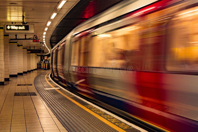 Metro Station and a Red and White Metro in a Motion Stock Image - Image ...