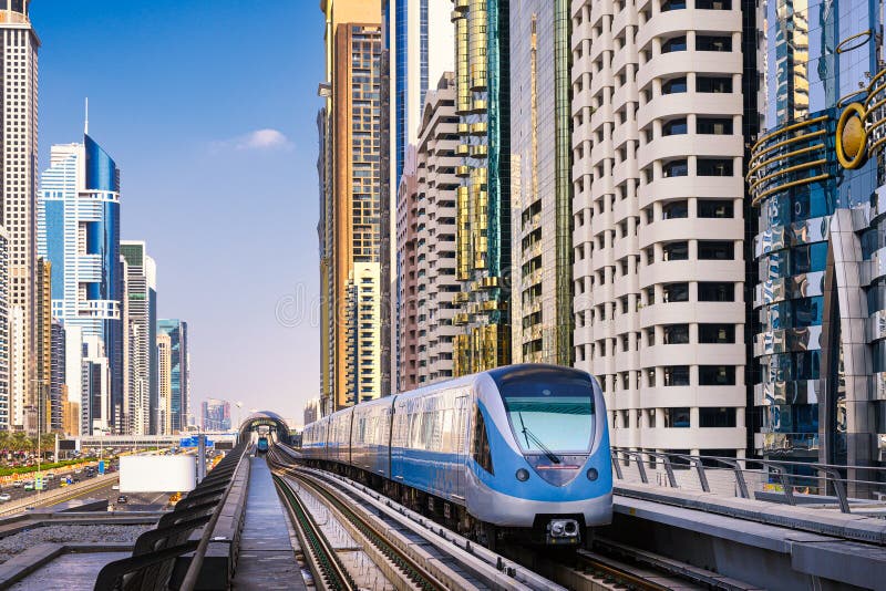 Metro train in Dubai, UAE stock photo. Image of skyline - 167912304