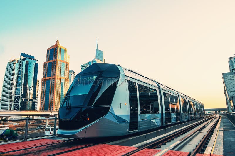 Metro Train on Rail Line in Dubai Downtown with Skyscrapers at ...