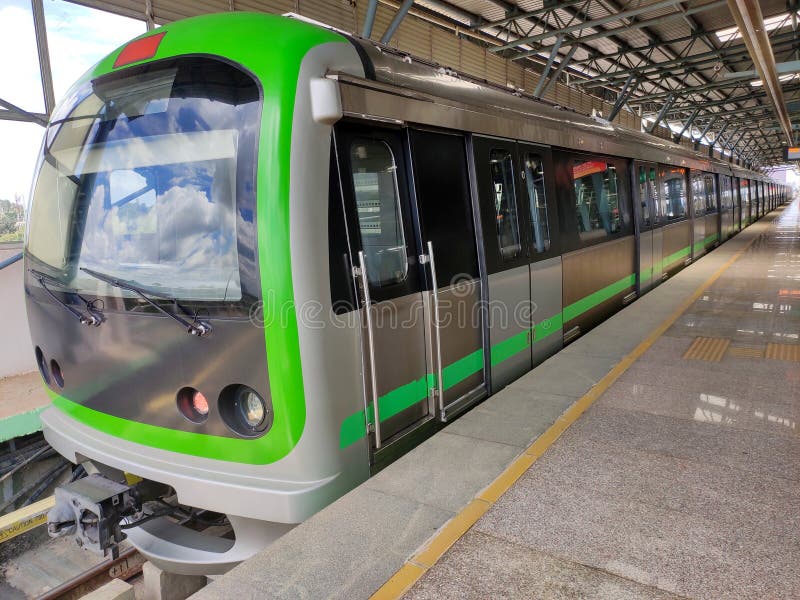The Metro Train Sat Idle on the Platform, Its Doors Closed and Its ...