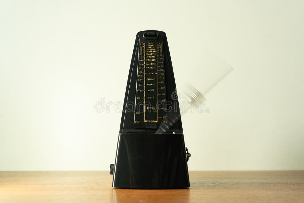Metronome with Swinging Pendulum Shot with Motion Blur Effect Stock ...